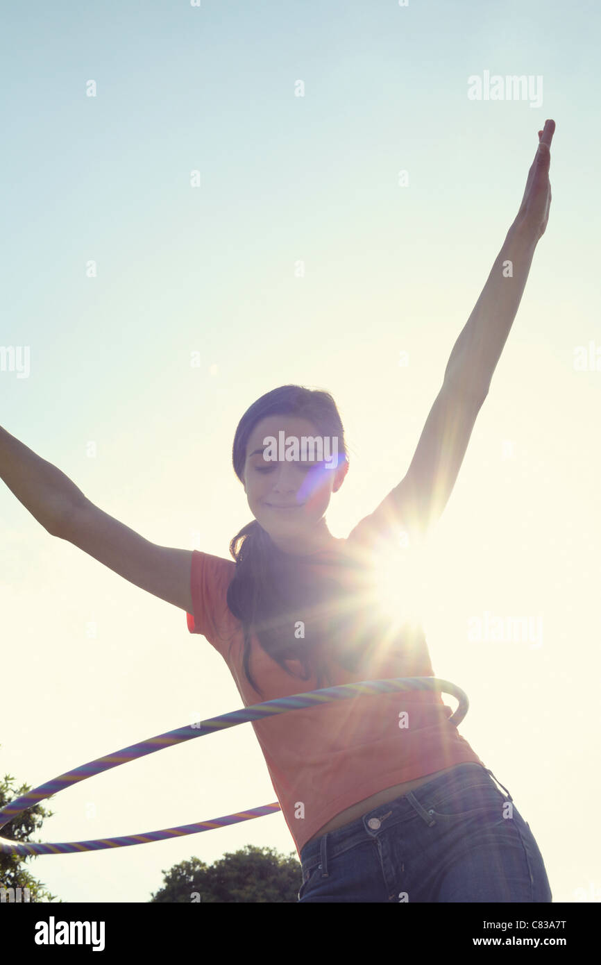 Woman hula hooping hi-res stock photography and images - Alamy