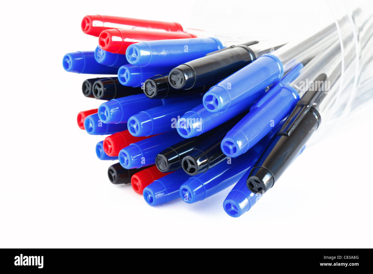 group of black, red and blue pens isolated over white background Stock ...