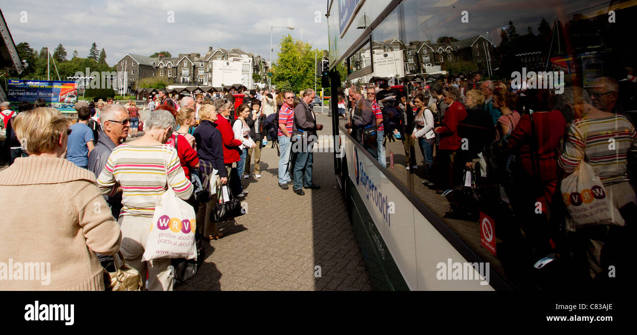 The Lakeland Experience open top Bus - passengers queuing to get on the ...