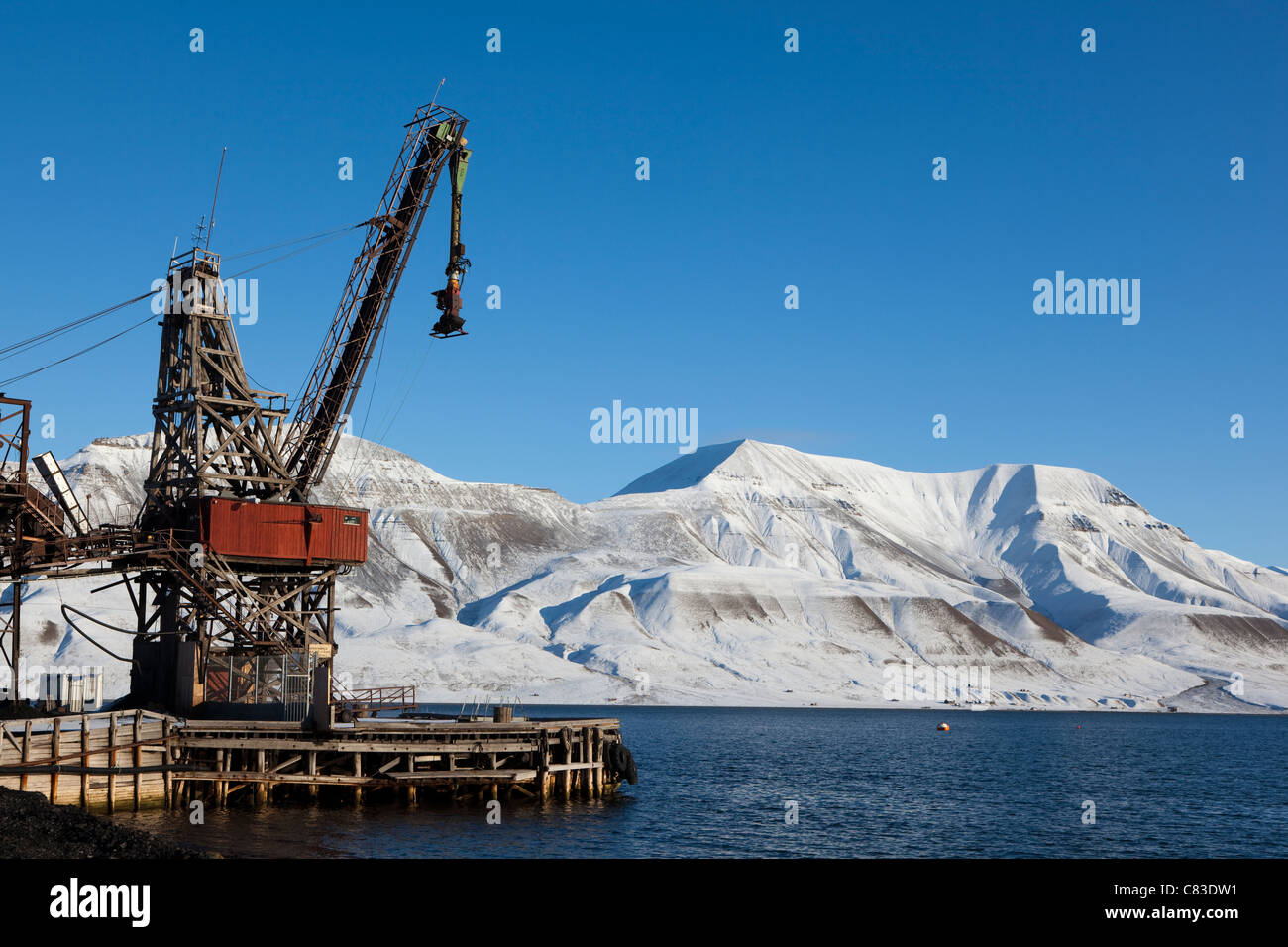 Coal mining machinery, port of Longyearbyen, Svalbard Stock Photo - Alamy