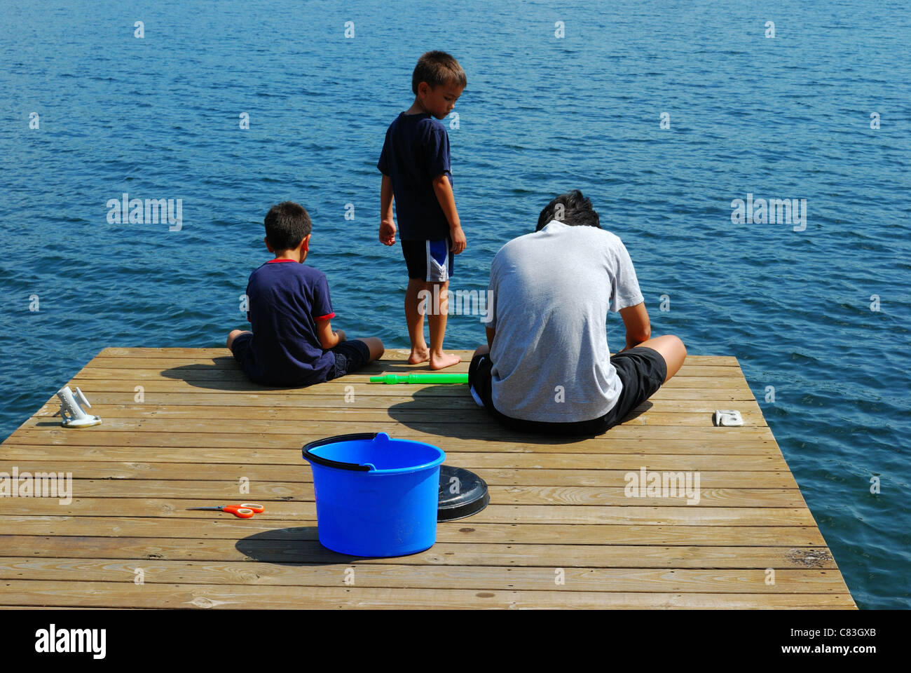 Fishing off pier hi-res stock photography and images - Alamy