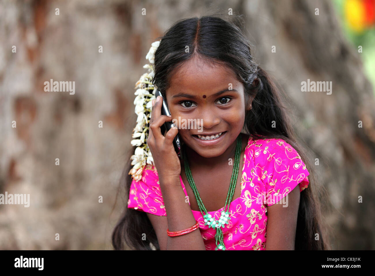 Indian girl using a mobile phone Andhra Pradesh South India Stock Photo ...