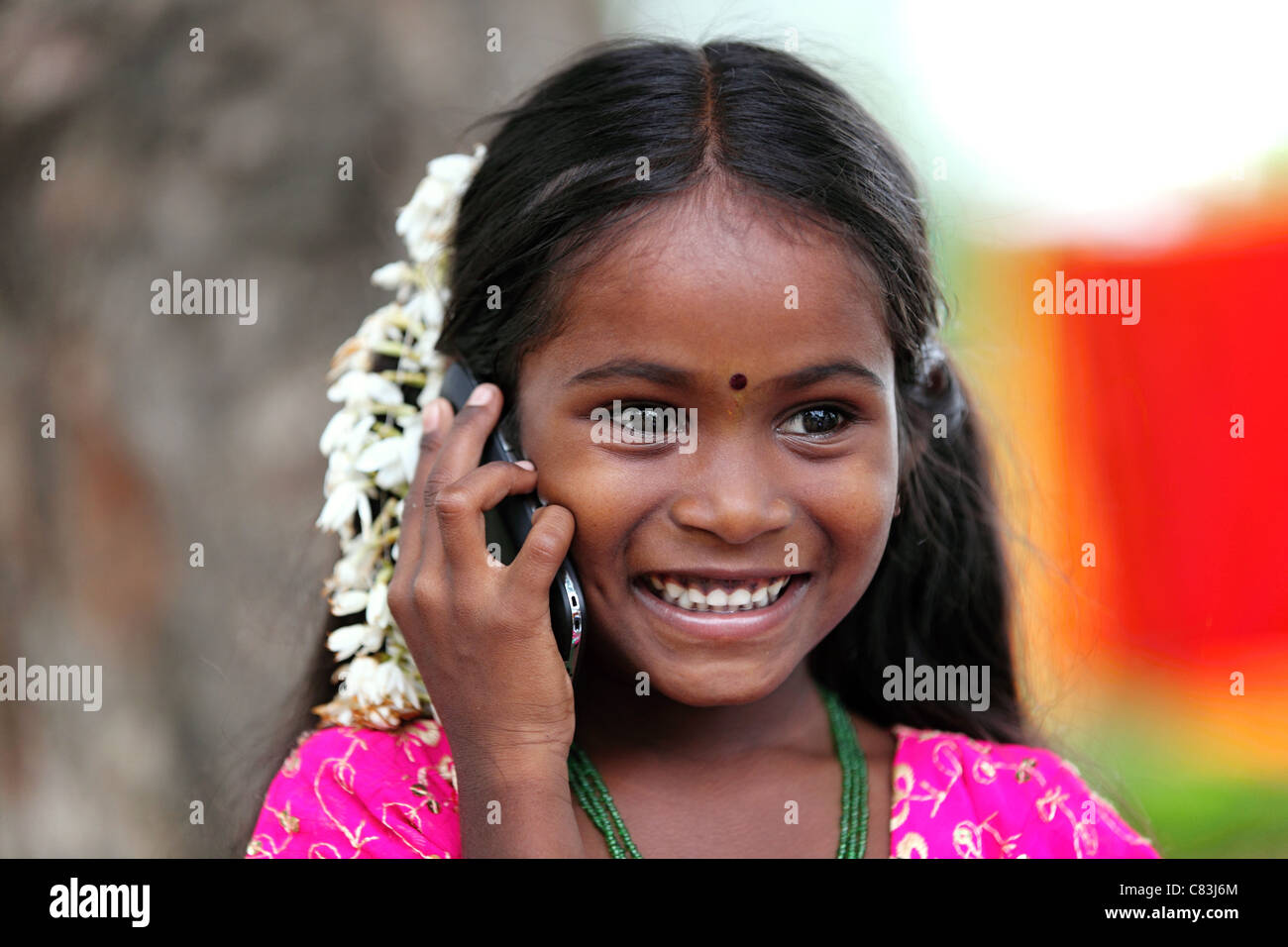 Indian girl using a mobile phone Andhra Pradesh South India Stock Photo ...