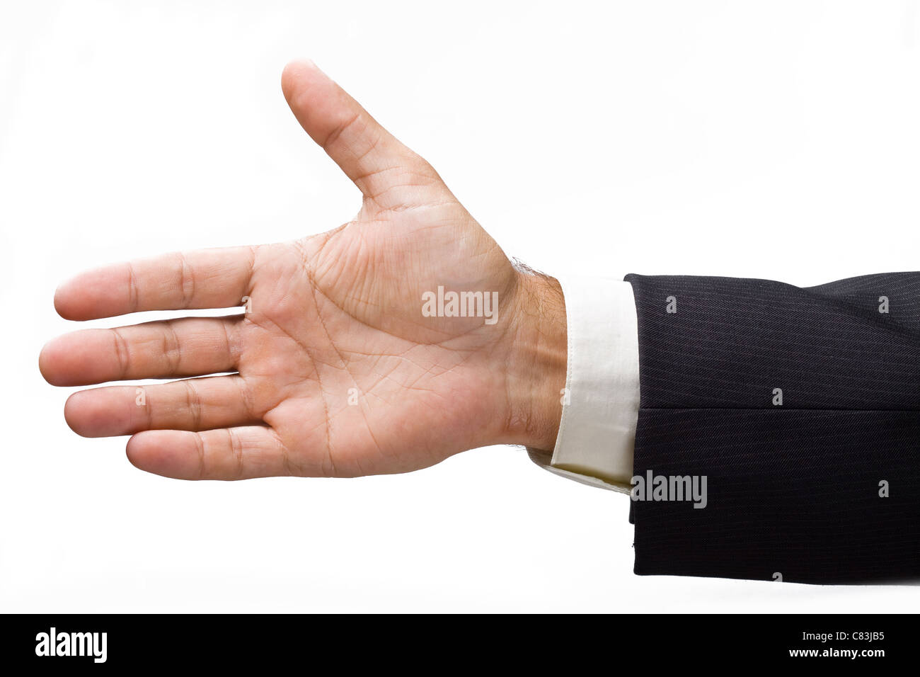Extended businessman's hand for a handshake. Isolated on a white ...