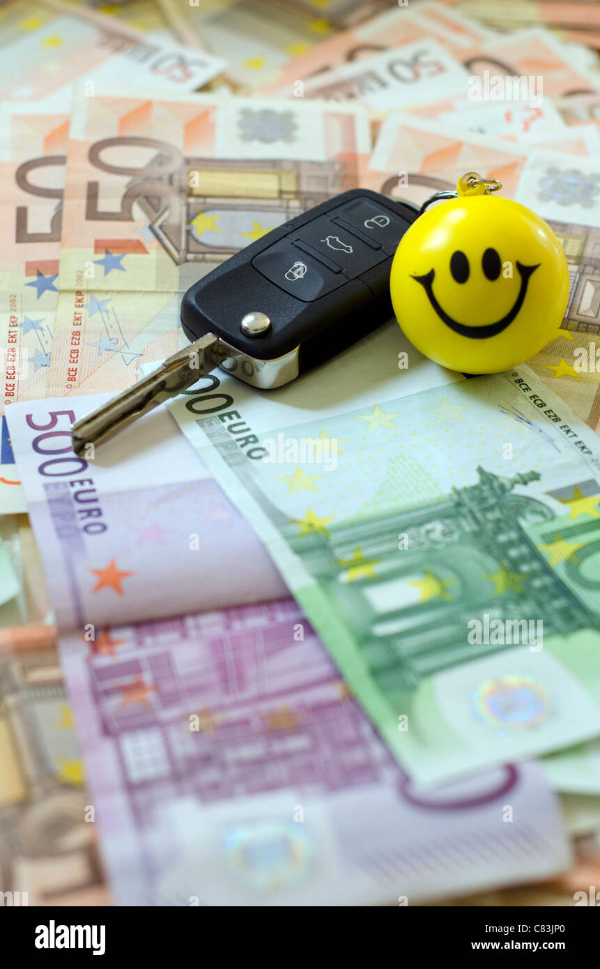 Car keys on European banknotes, symbol, investment Stock Photo - Alamy