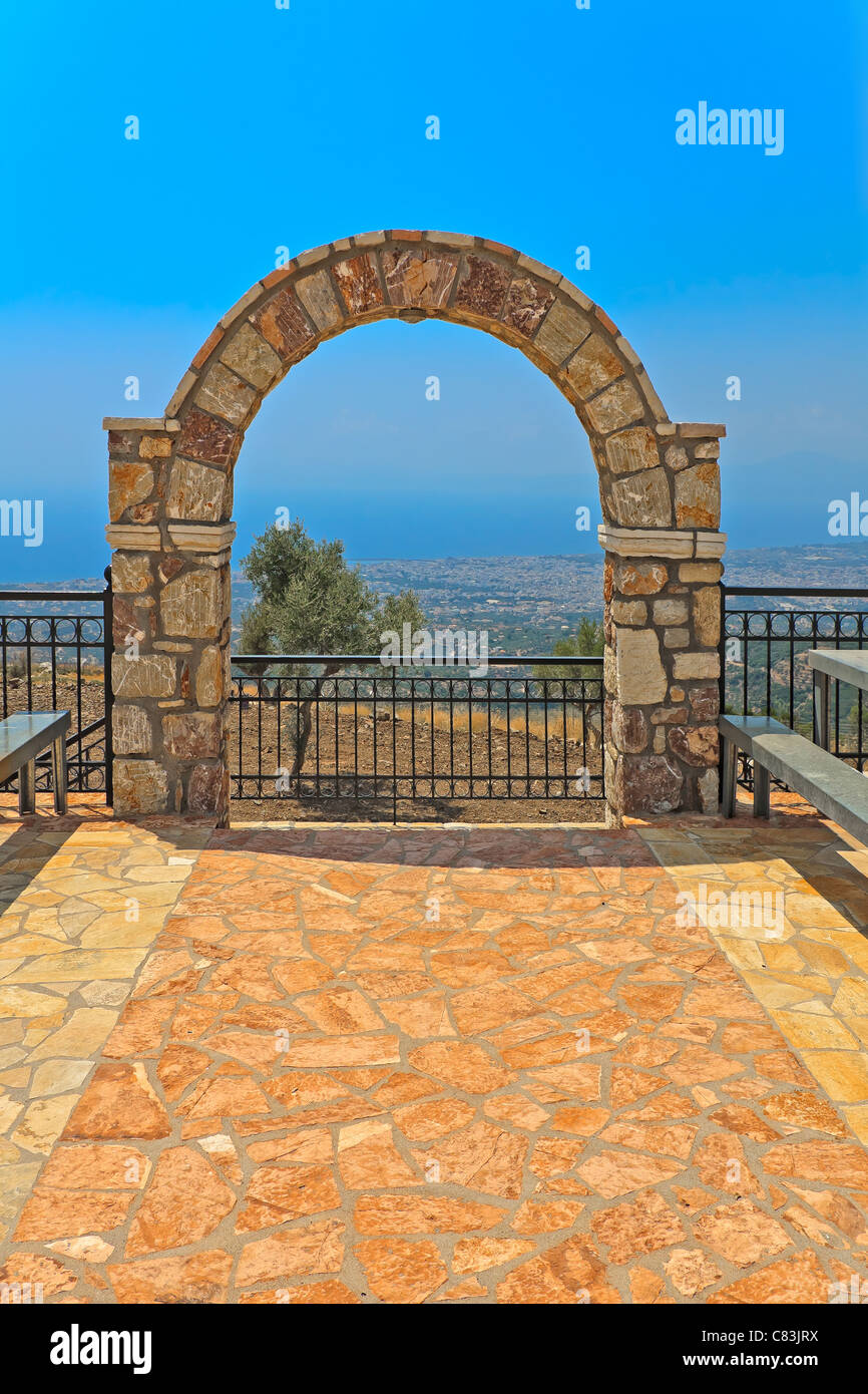 Stone arc and cityscape in Greece against blue sky Stock Photo - Alamy