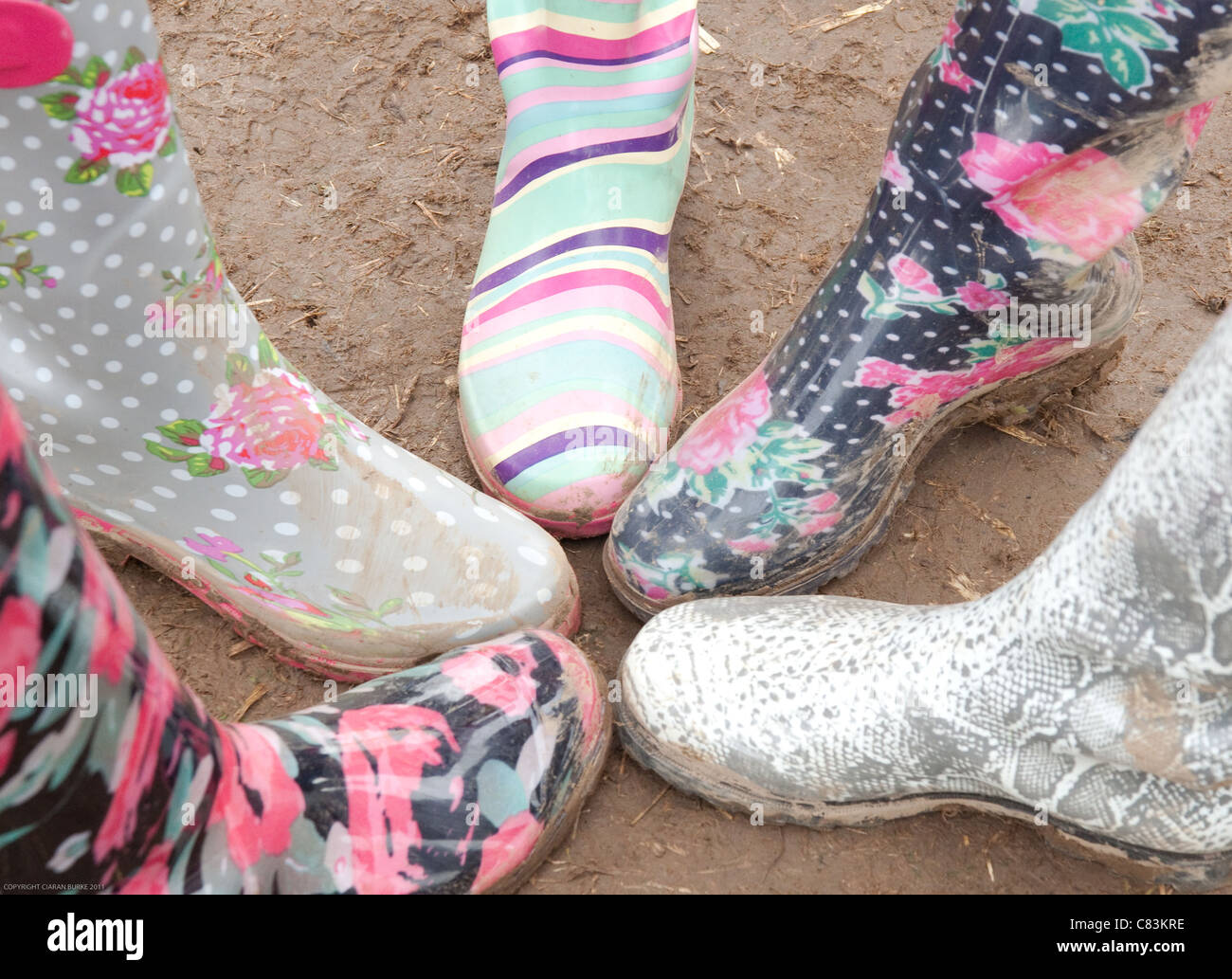 FIVE COLOURFUL BOOTS TOE TO TOE Stock Photo - Alamy