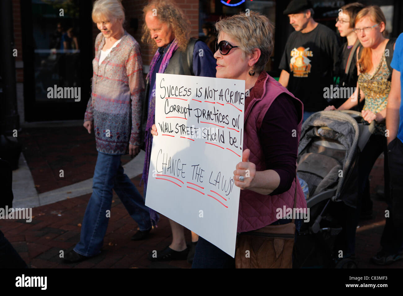 Carrying sign hi-res stock photography and images - Alamy