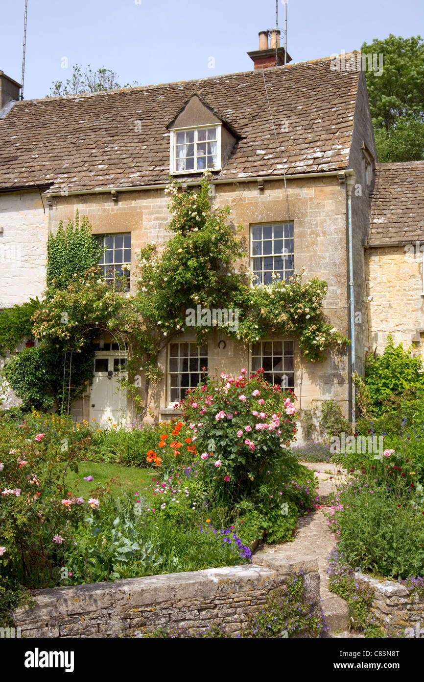 Pretty climbing rose covered Cotswold cottage, near Avening ...