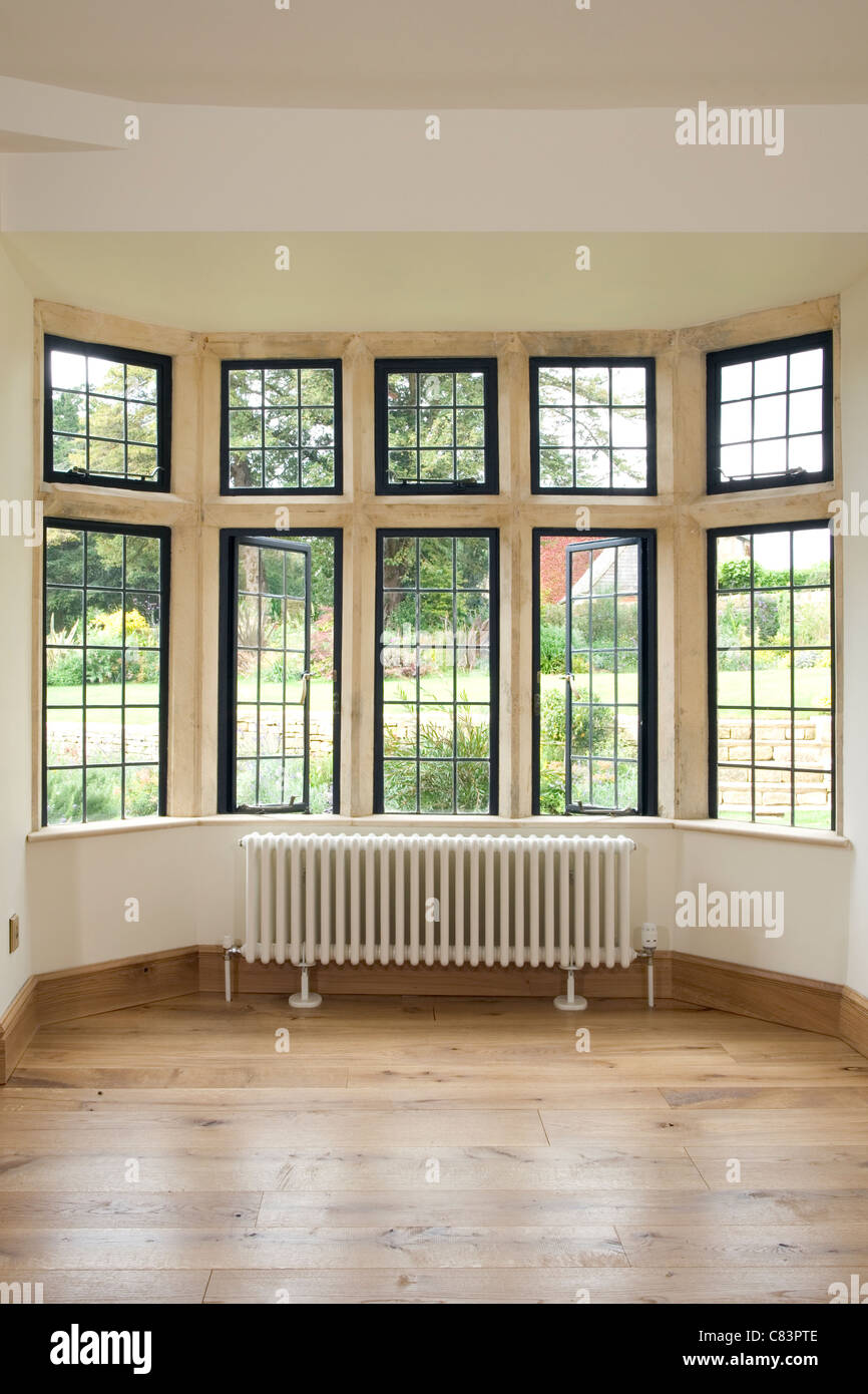 Newly refurbished unfurnished leaded light bay window Stock Photo - Alamy