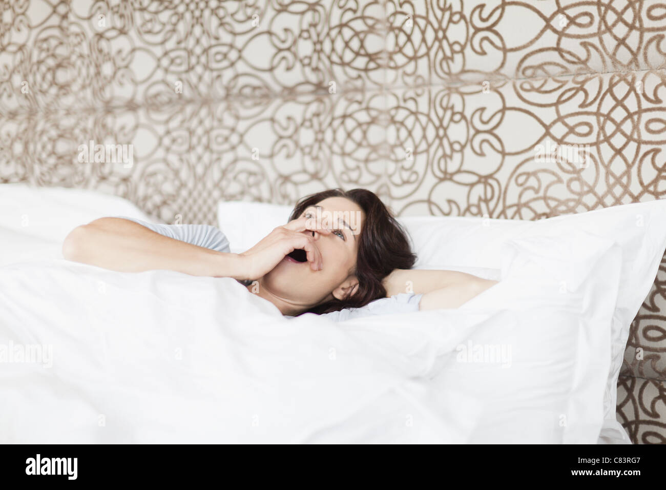 Yawning mature women hi-res stock photography and images - Alamy