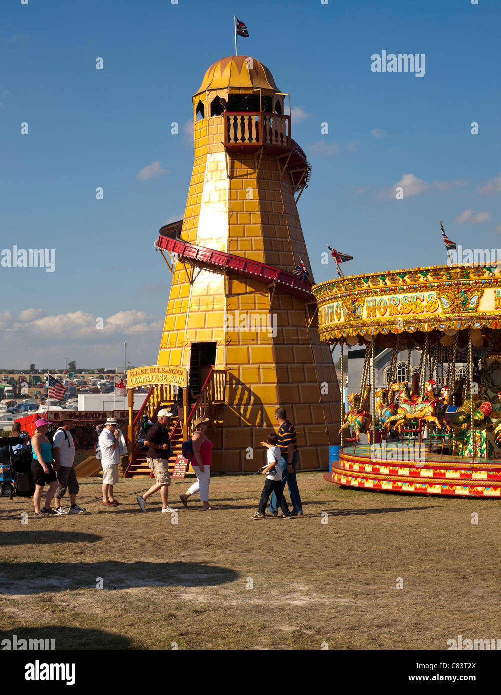 vintage slide at a fairground under blue sky Stock Photo - Alamy