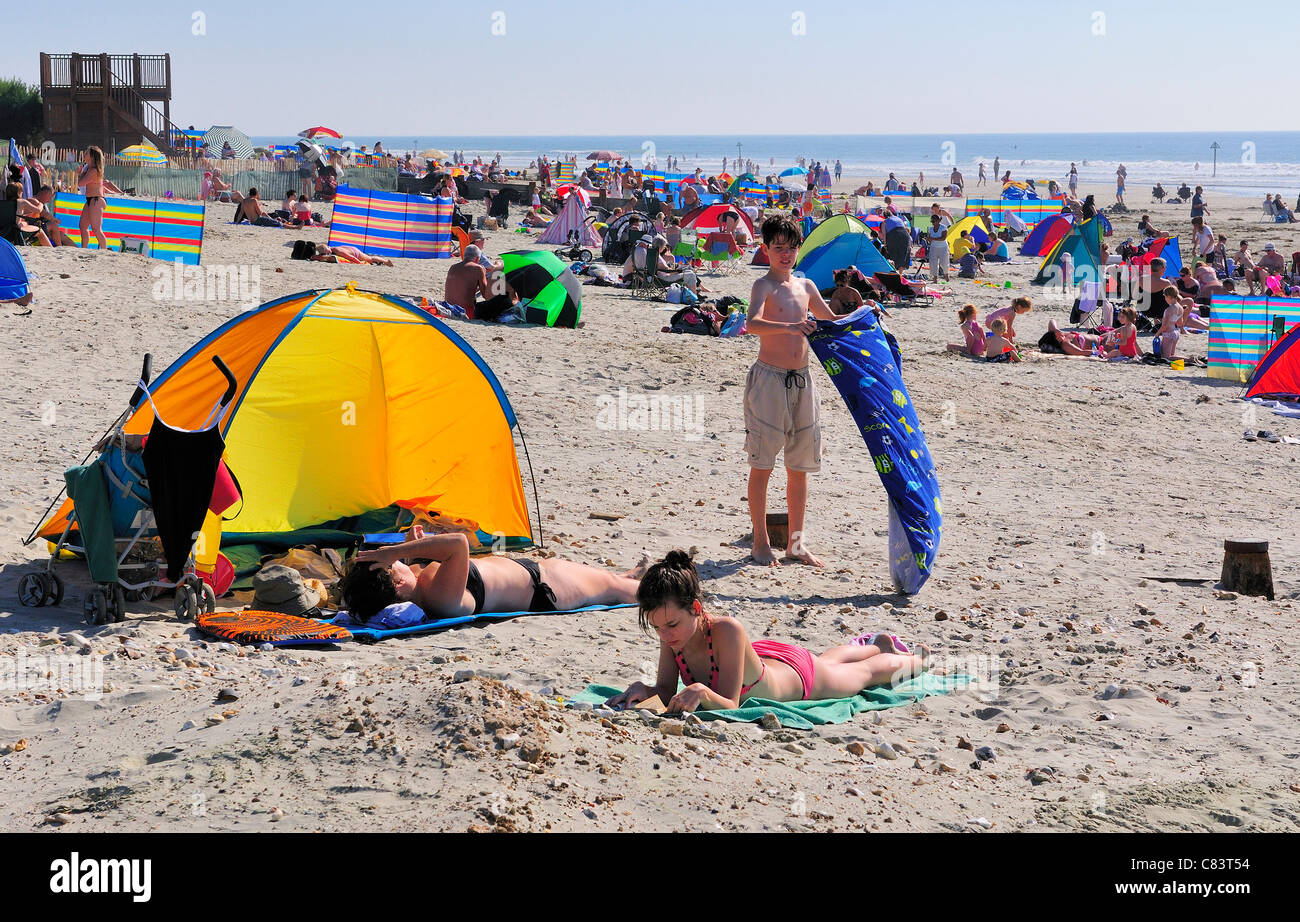 Mature Couple Sunbathing On Beach High Resolution Stock Photography and ...