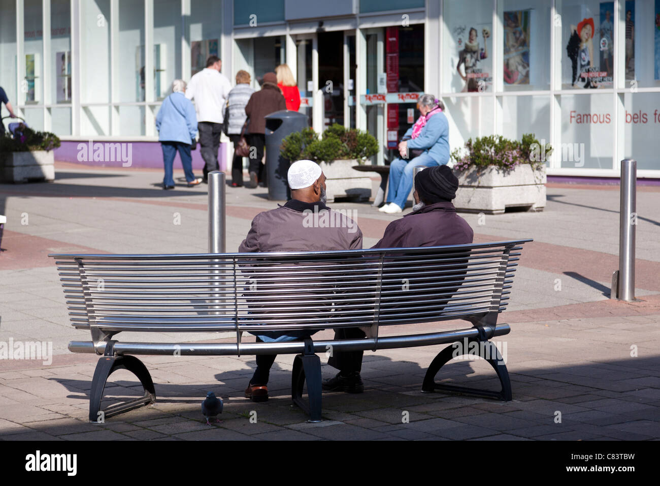 Two men seat on hi-res stock photography and images - Alamy