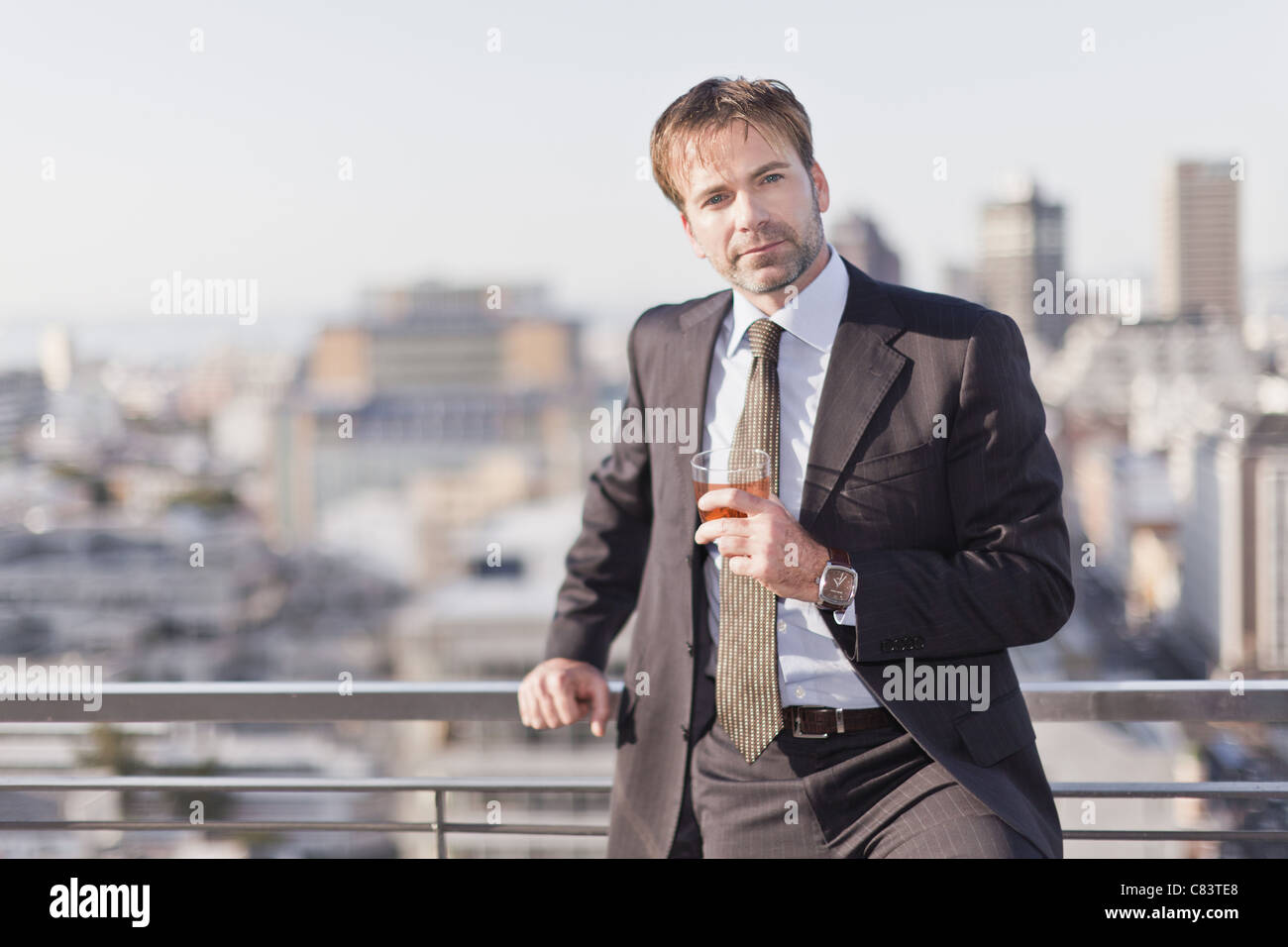 Business people on rooftop balcony hi-res stock photography and images ...