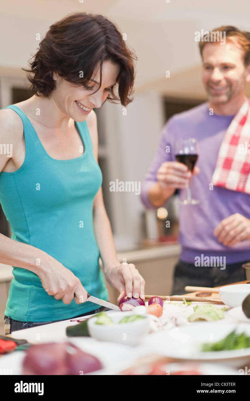 Woman cooking dinner in kitchen Stock Photo - Alamy