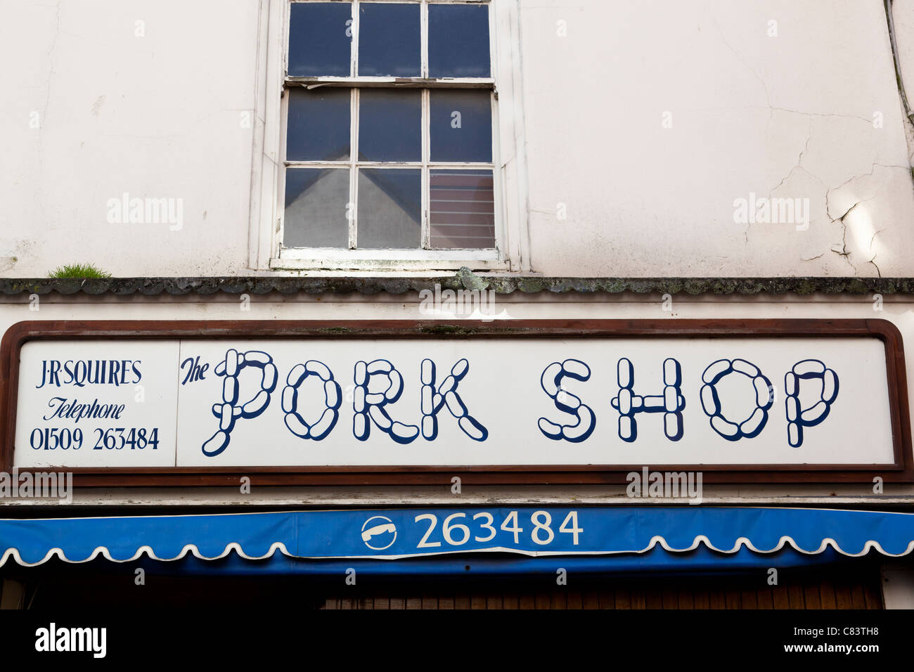 Amusing shop sign - pork shop Stock Photo - Alamy
