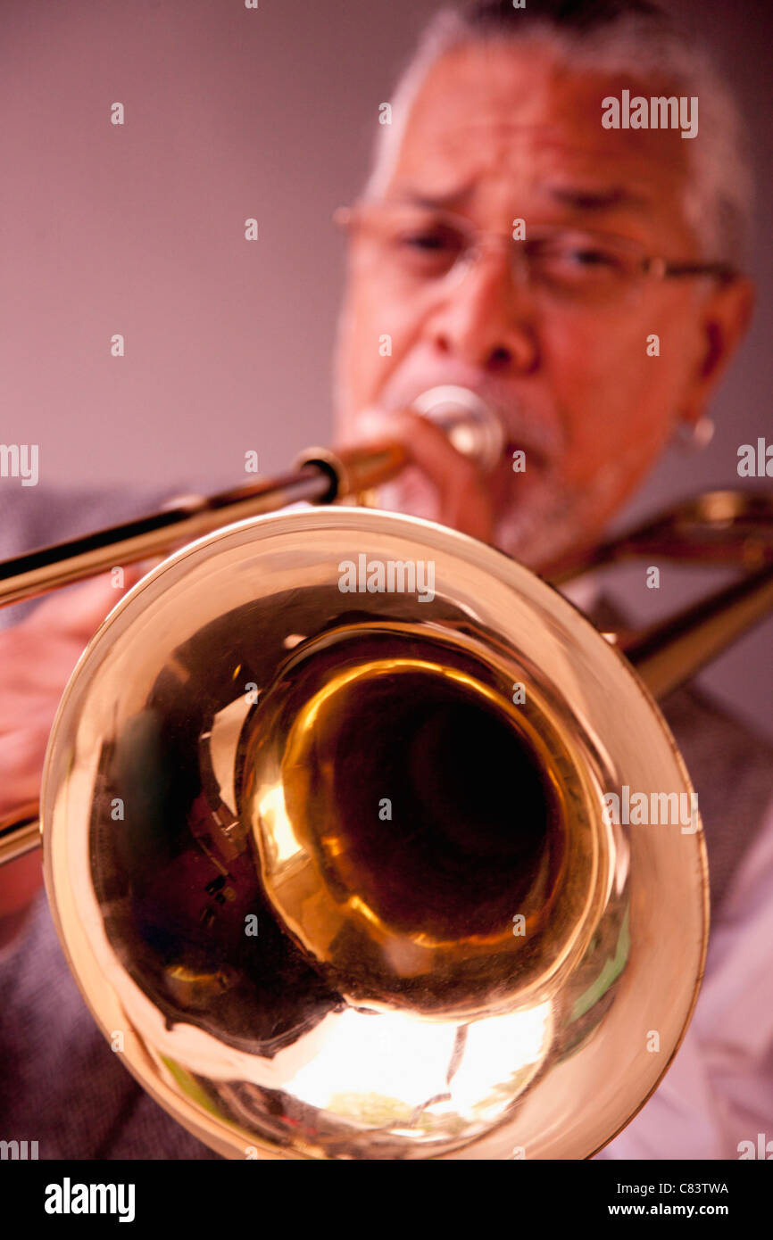 Musician holding trombone hi-res stock photography and images - Alamy