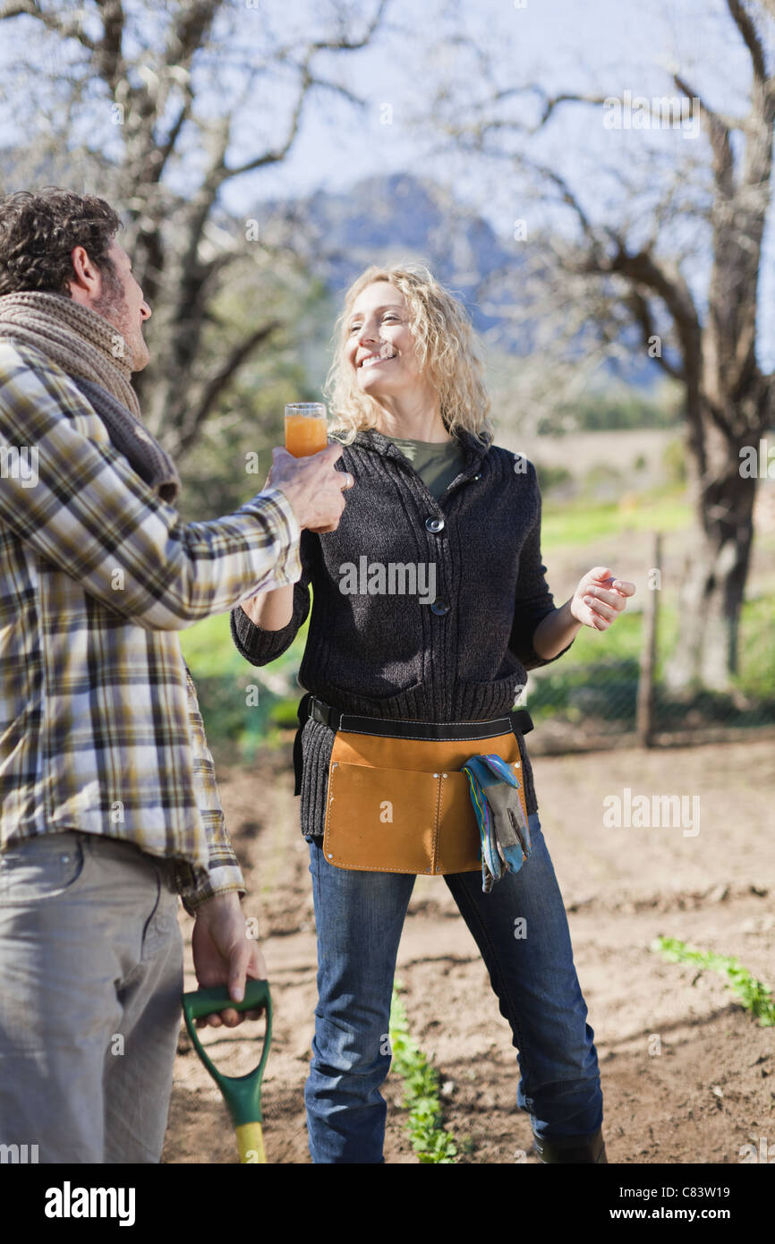 Three women bringing fruit hi-res stock photography and images - Alamy