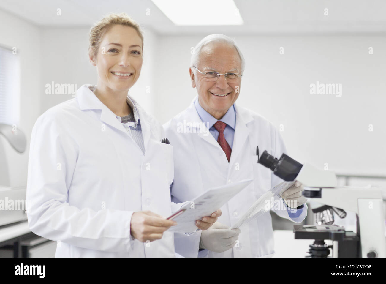 Scientists talking in pathology lab Stock Photo - Alamy
