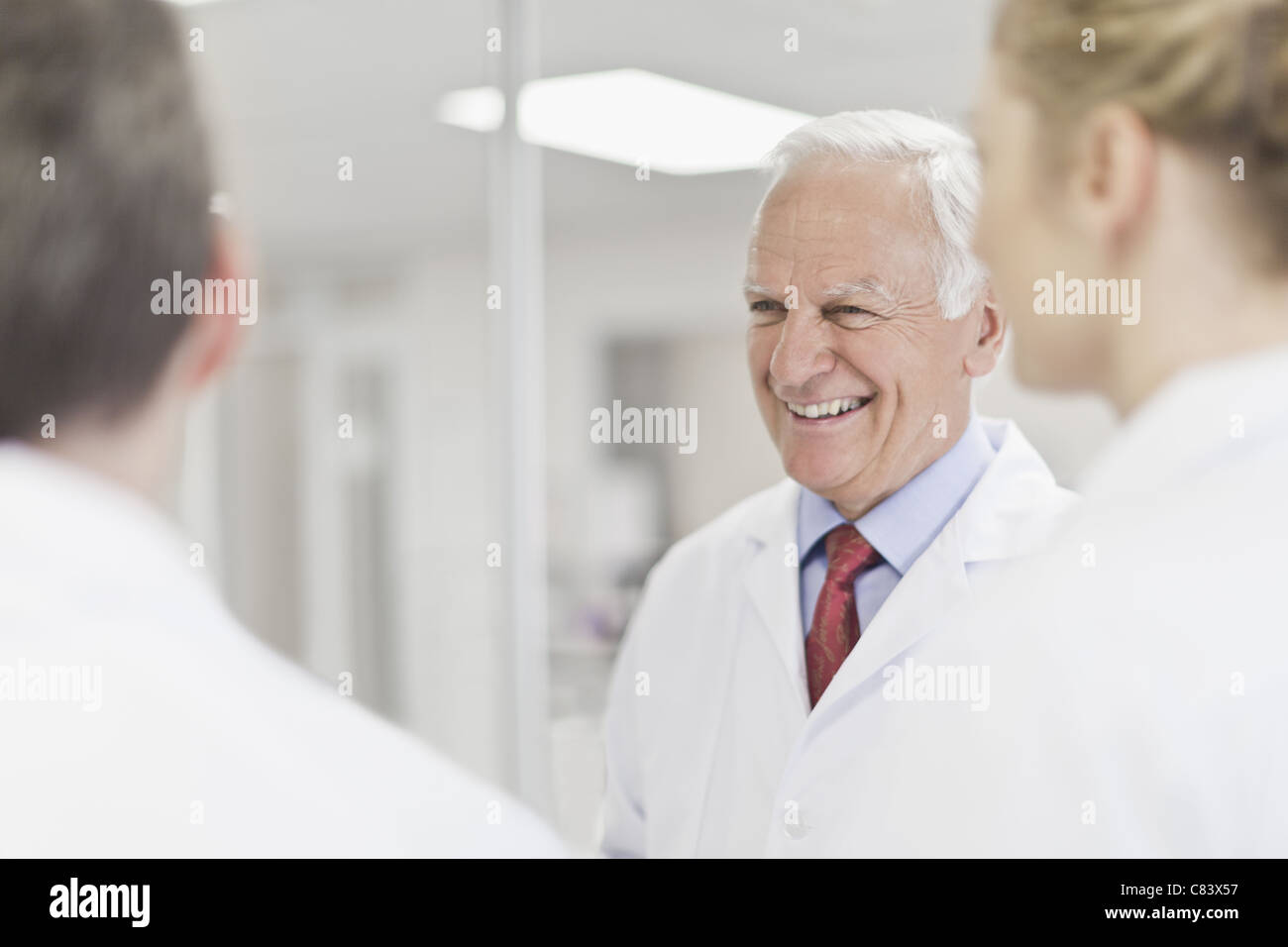 Scientist smiling in pathology lab Stock Photo - Alamy