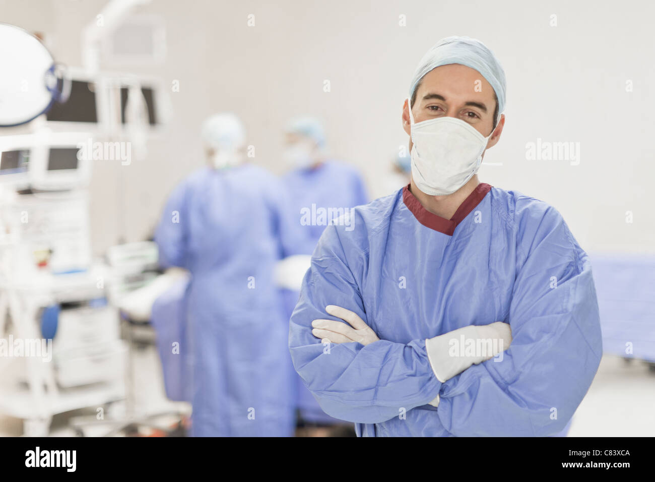 Doctor standing in operating room Stock Photo - Alamy