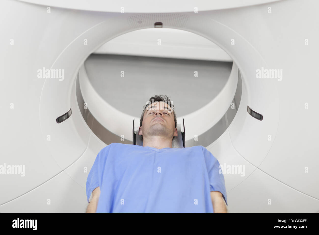 Patient laying in CT scanner in hospital Stock Photo - Alamy