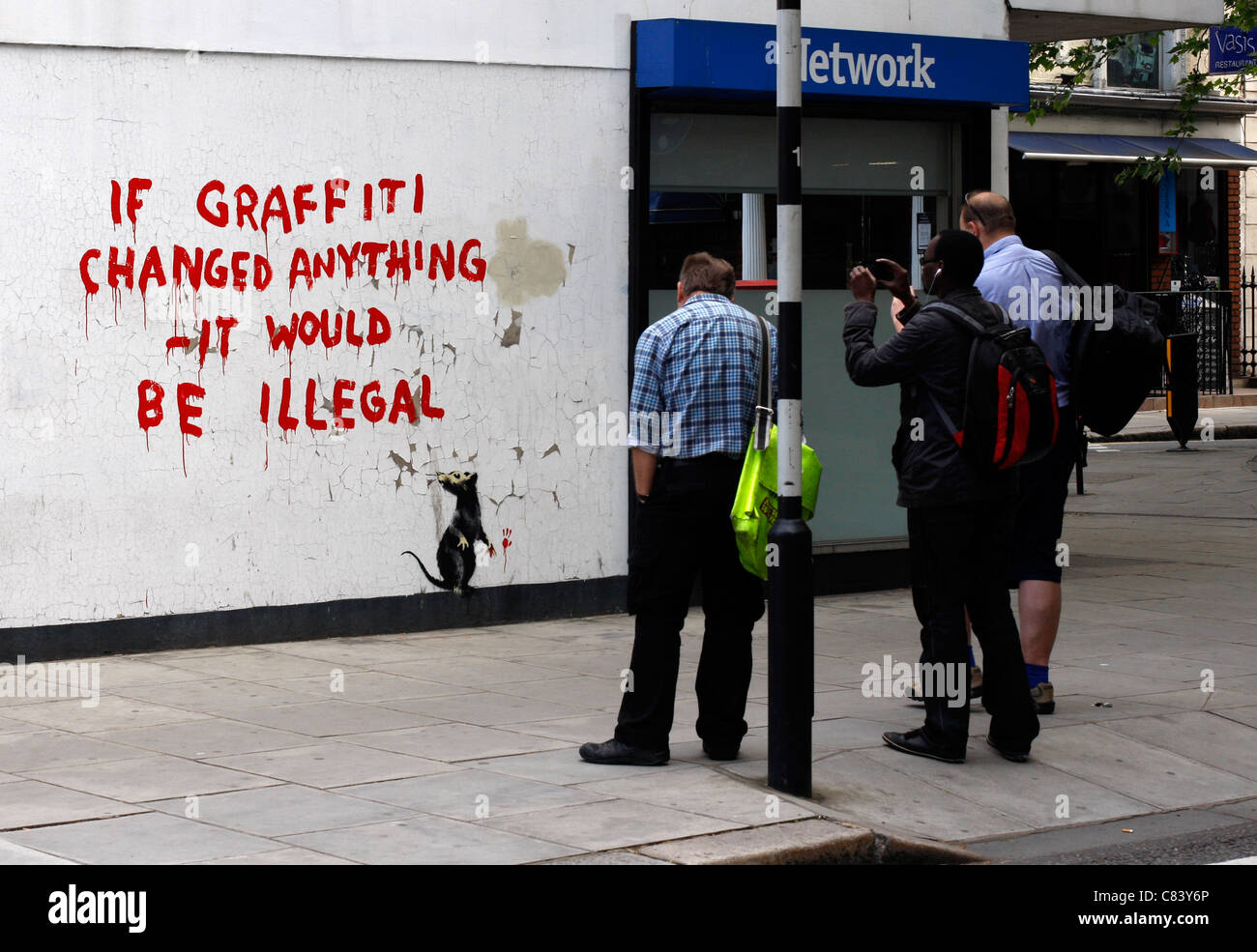 Banksy graffiti on a wall in Clipstone Street, central London Stock ...