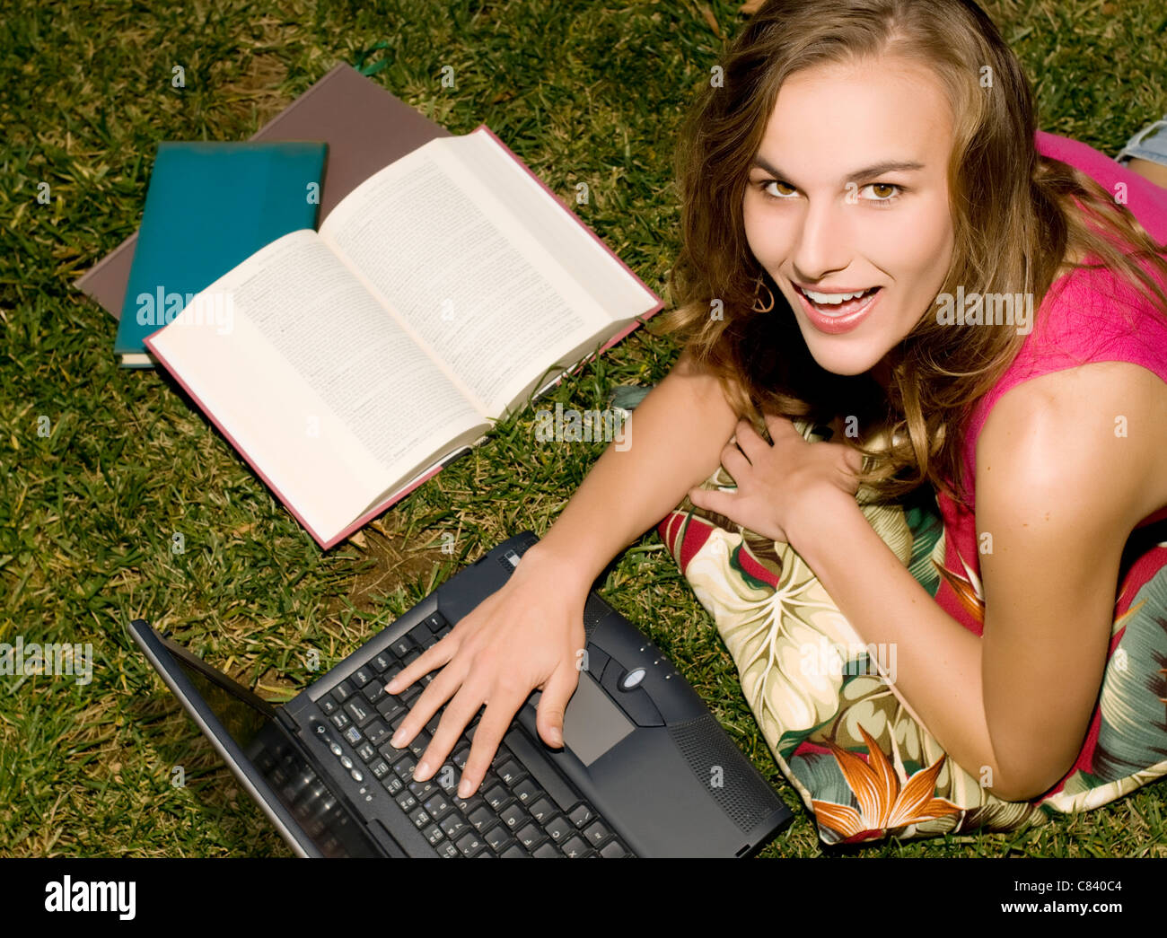 College Girl Studying in the Grass Stock Photo - Alamy