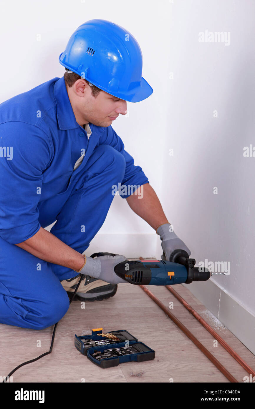 Plumber installing copper pipes hi-res stock photography and images - Alamy