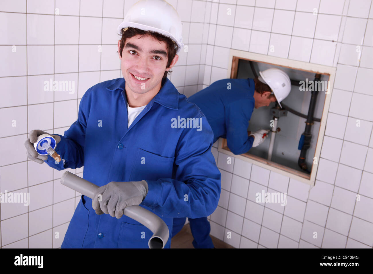 portrait of a young plumber Stock Photo - Alamy