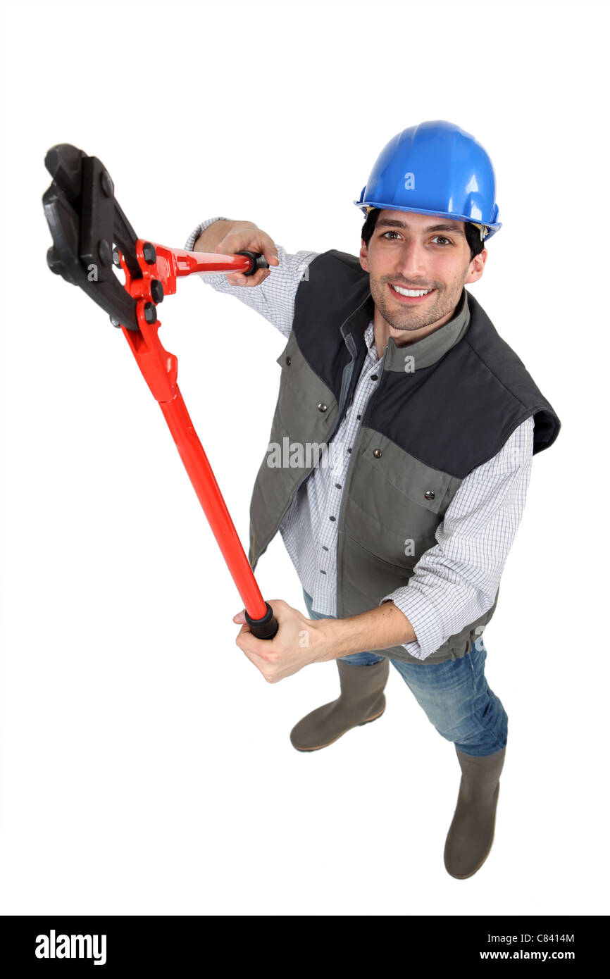 A male construction worker using pliers Stock Photo - Alamy