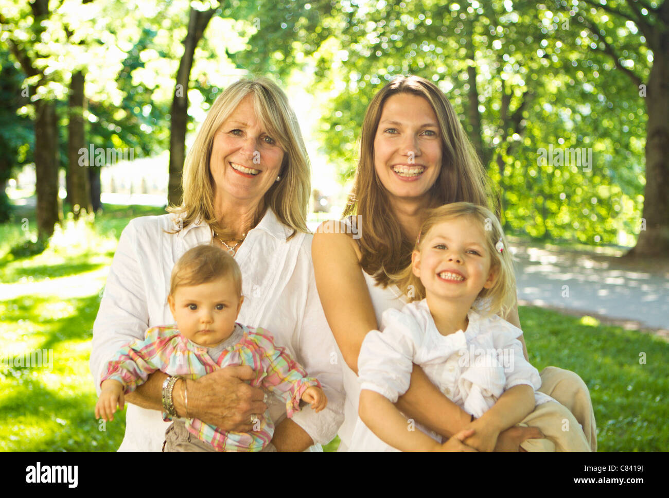Three generations of women smiling Stock Photo - Alamy