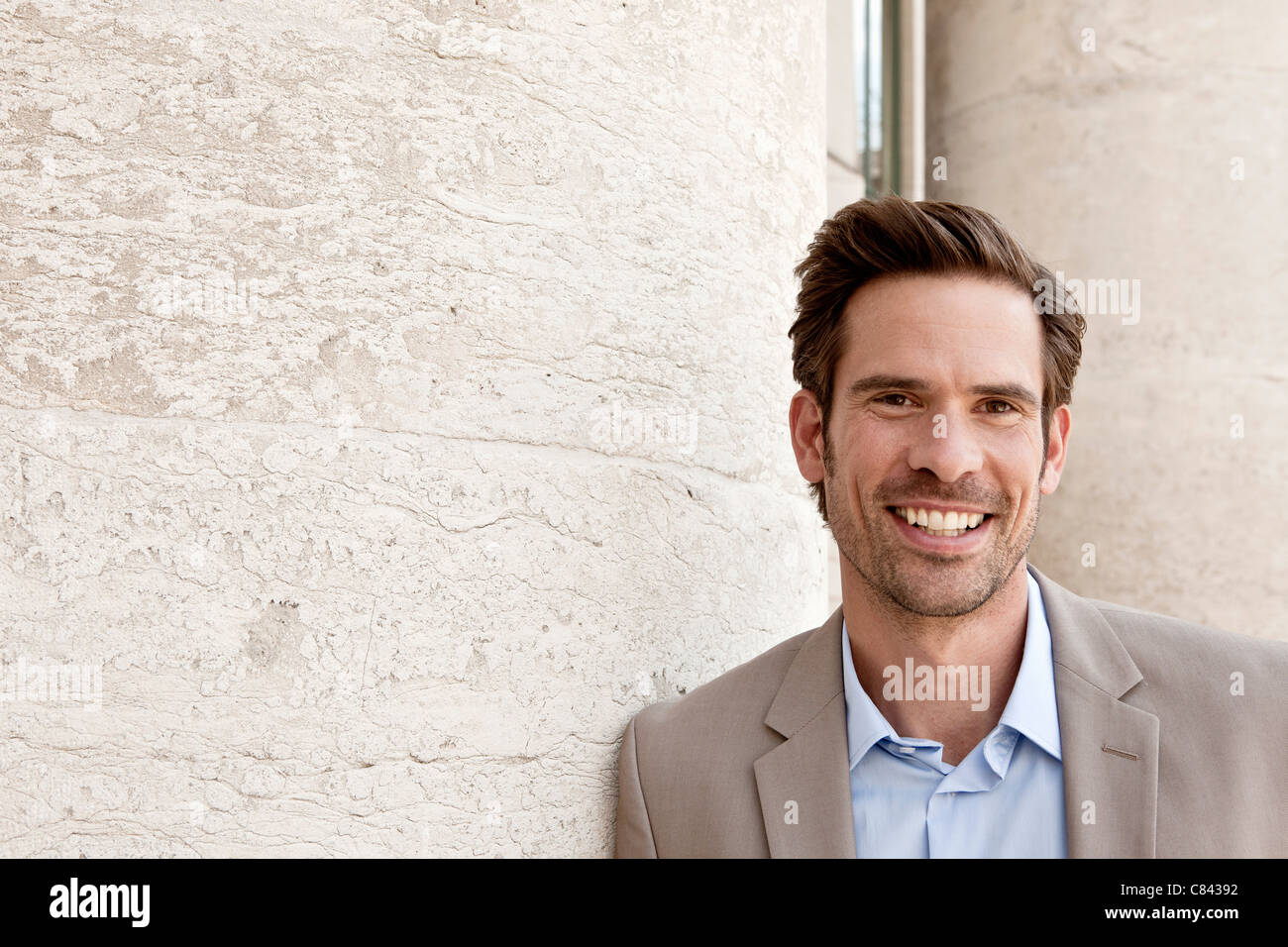 Man smiling outdoors Stock Photo - Alamy