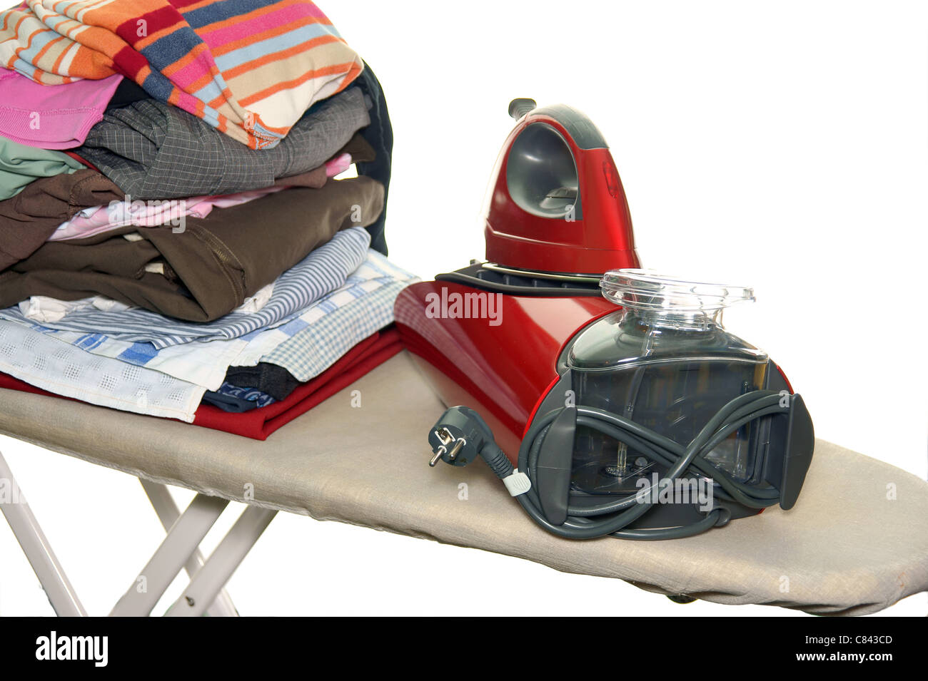 pile of ironing on white background Stock Photo - Alamy