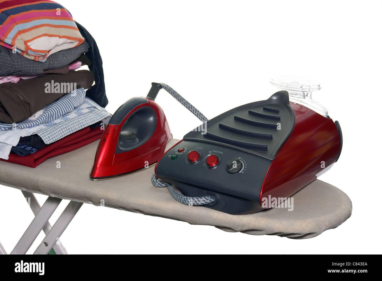 pile of ironing on white background Stock Photo - Alamy
