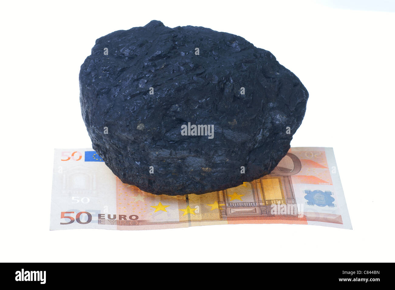 coal, carbon nuggets and euro banknote Stock Photo - Alamy