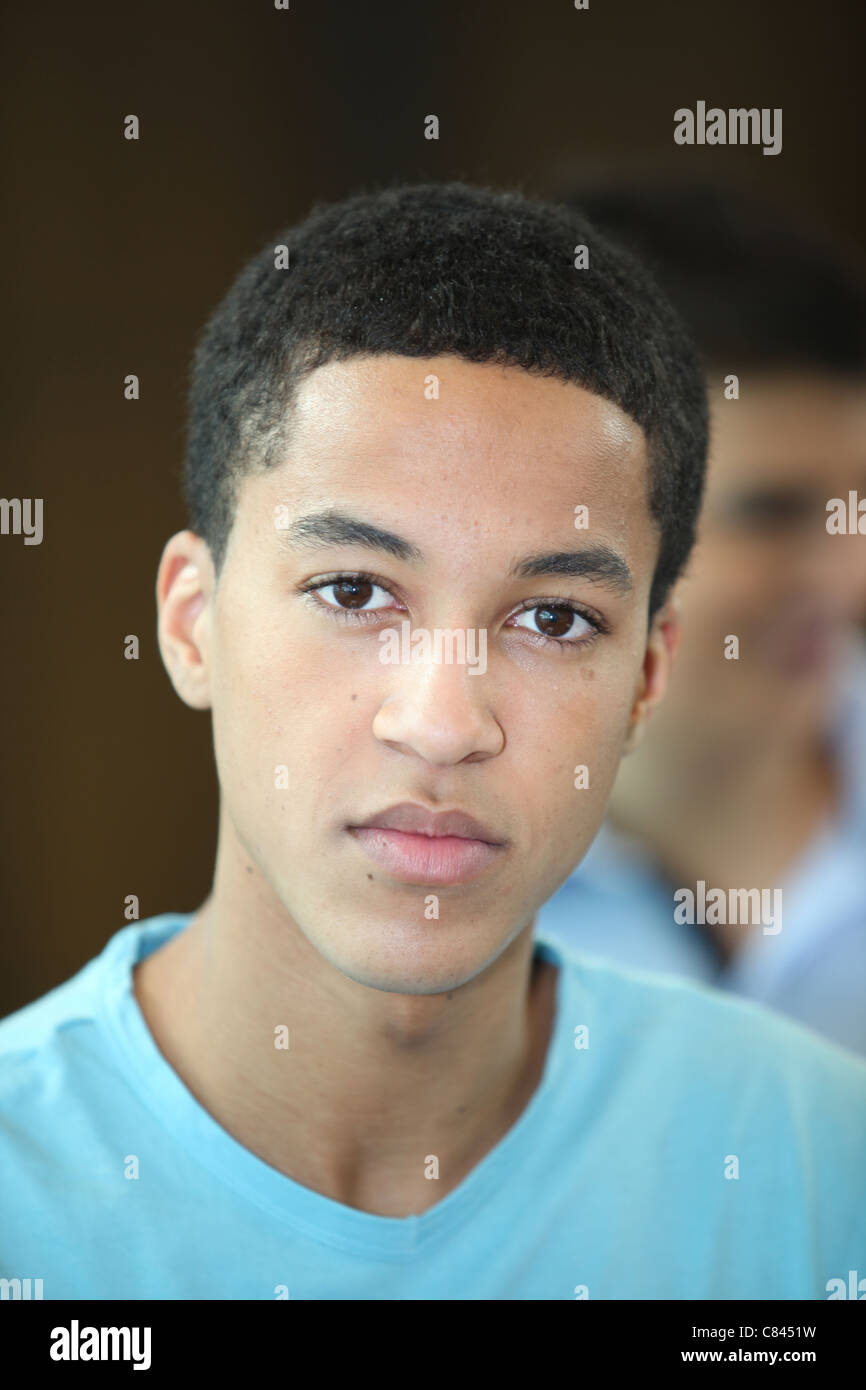 Portrait of a teenager with a neutral expression Stock Photo - Alamy
