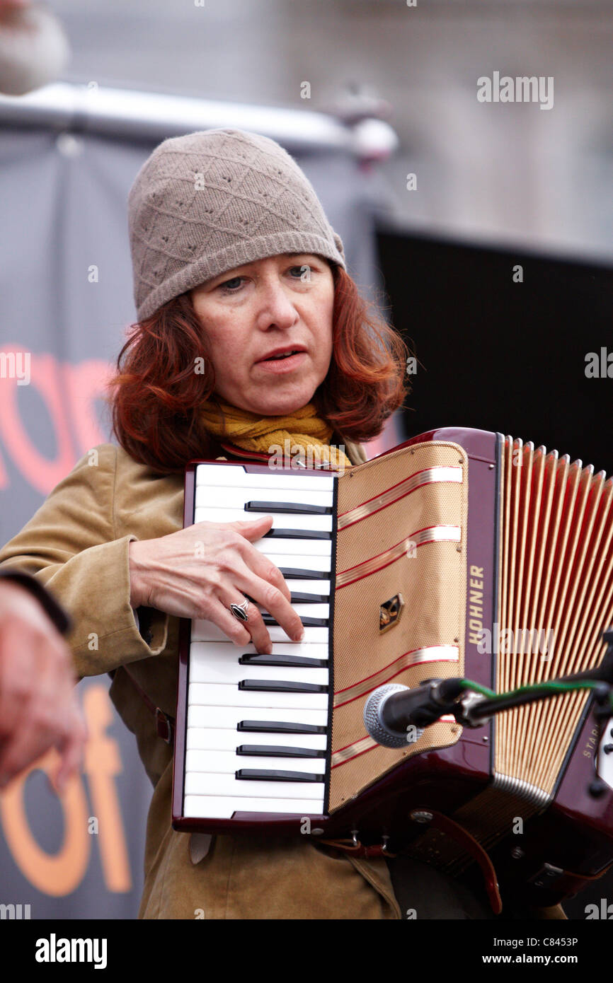 A musician performs at the Anti War Mass Assembly on the 10th ...