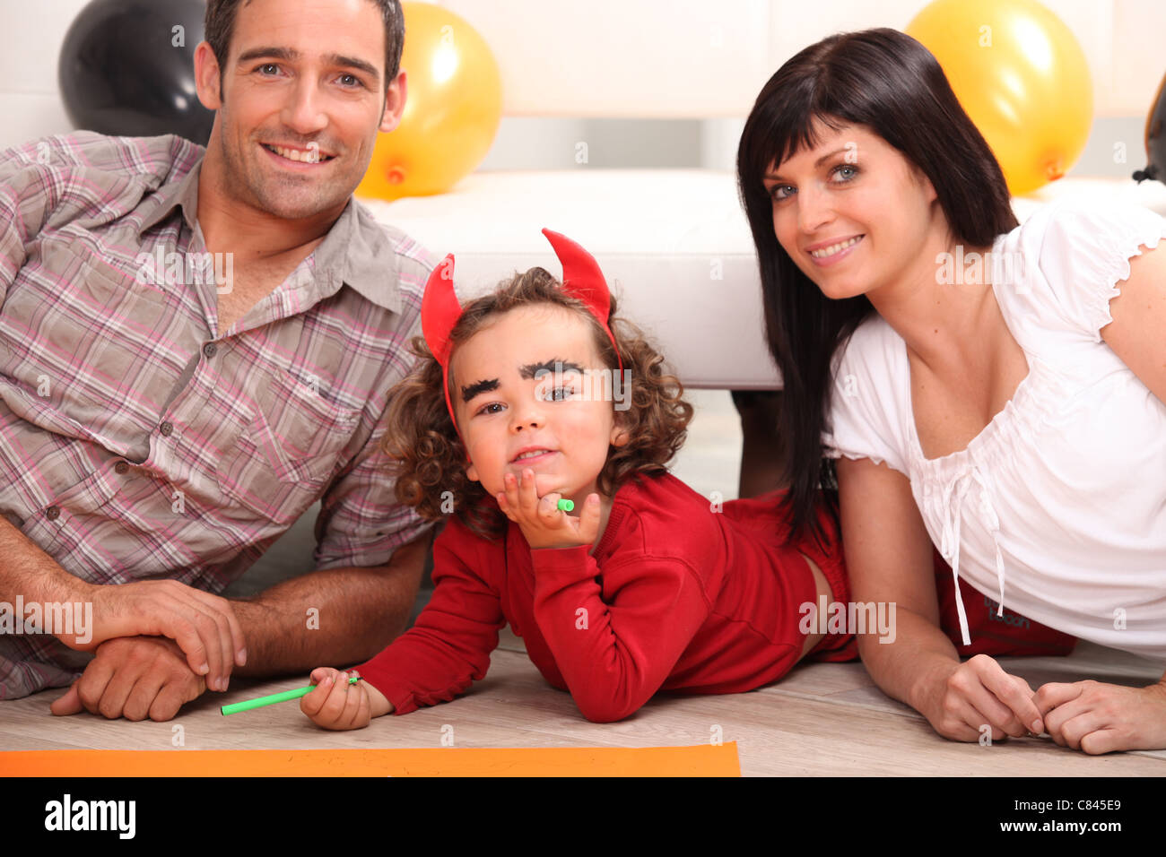 Little girl dressed as devil Stock Photo - Alamy