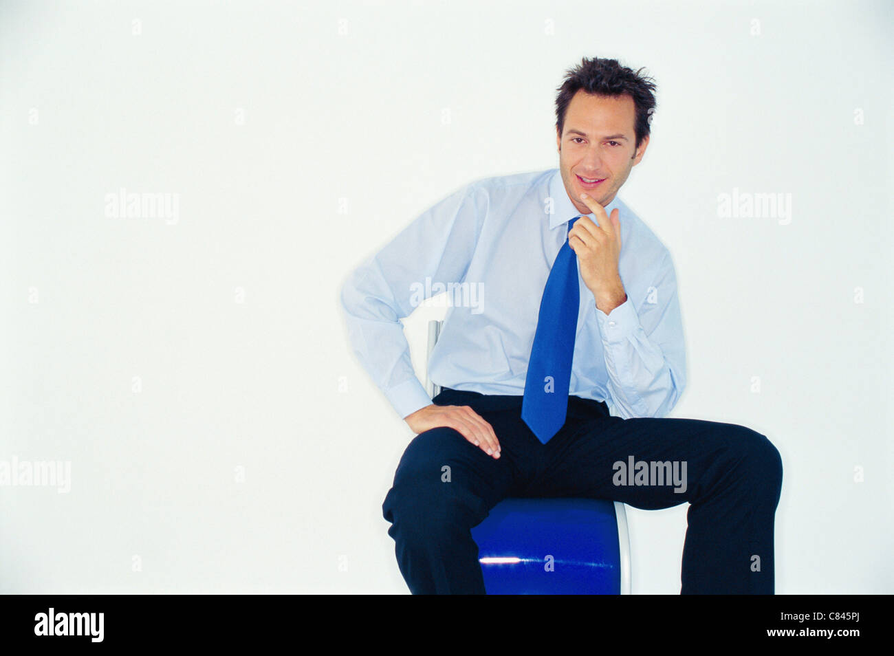 Chair sitting smile hi-res stock photography and images - Alamy