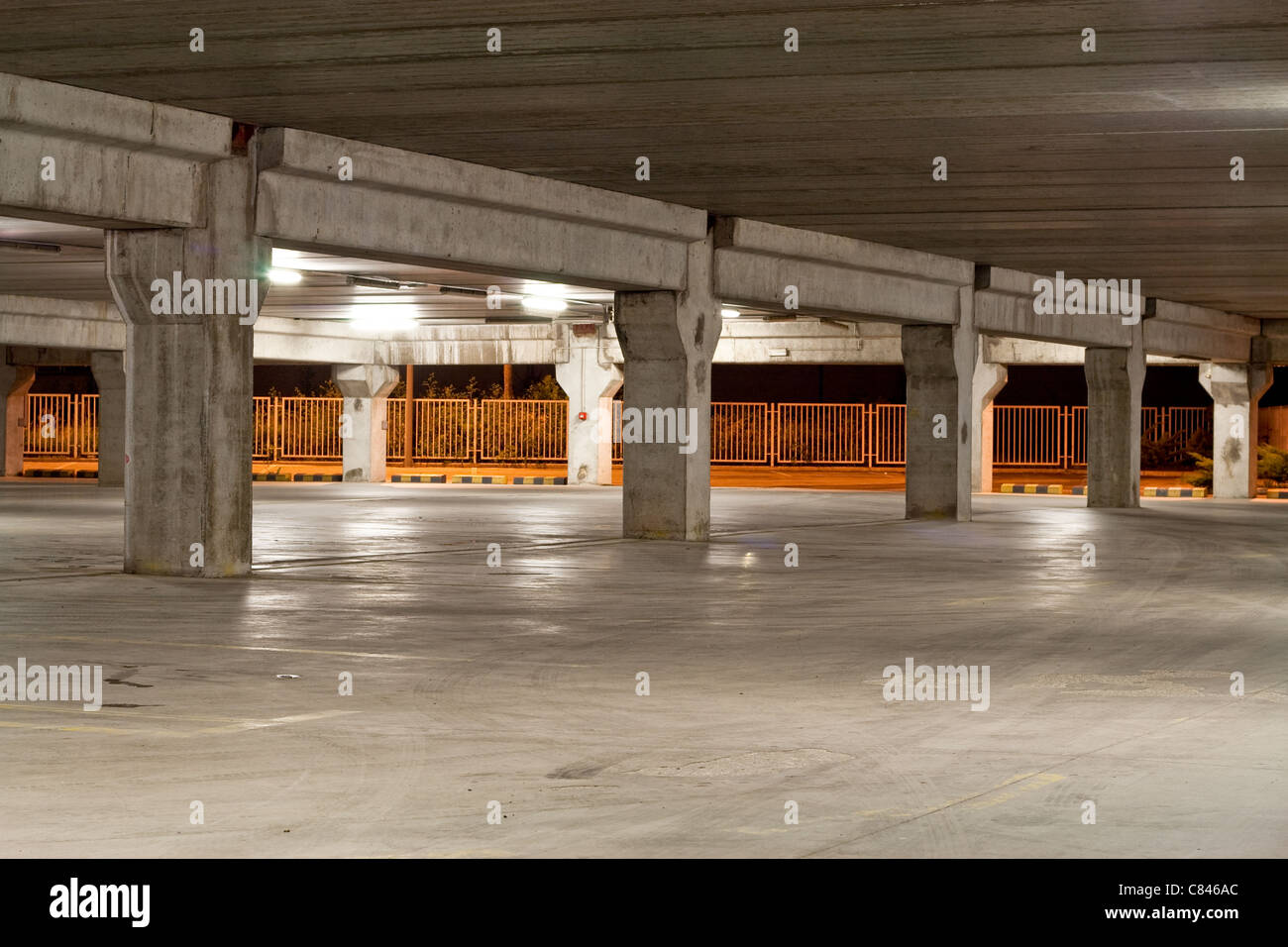 Shopping mall garage by night Stock Photo - Alamy
