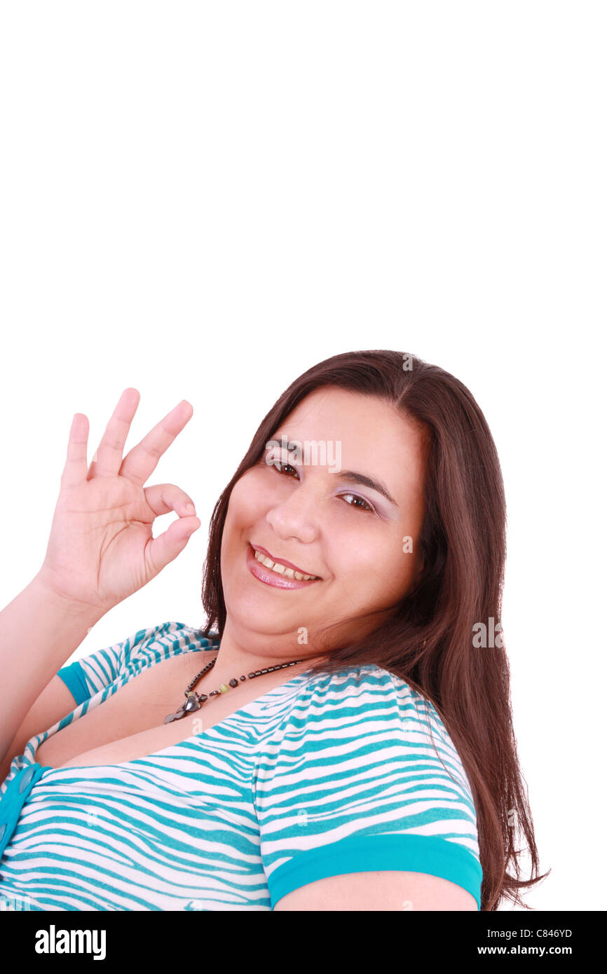 young happy woman giving ok hand sign Stock Photo - Alamy