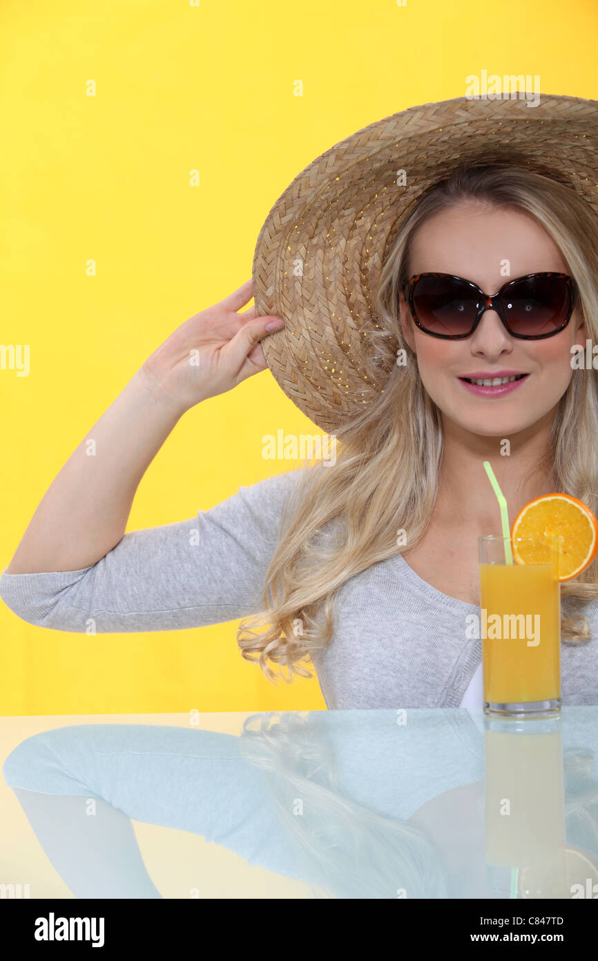 Woman with orange background Stock Photo - Alamy