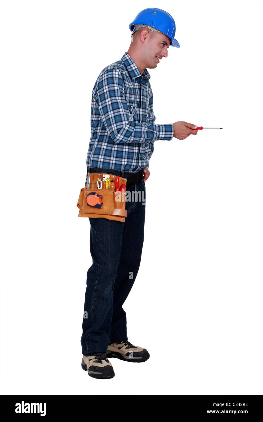 Man using screwdriver Stock Photo - Alamy