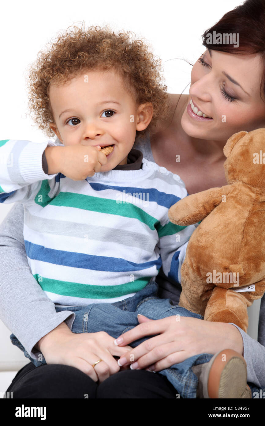 Mother hugging her son Stock Photo - Alamy