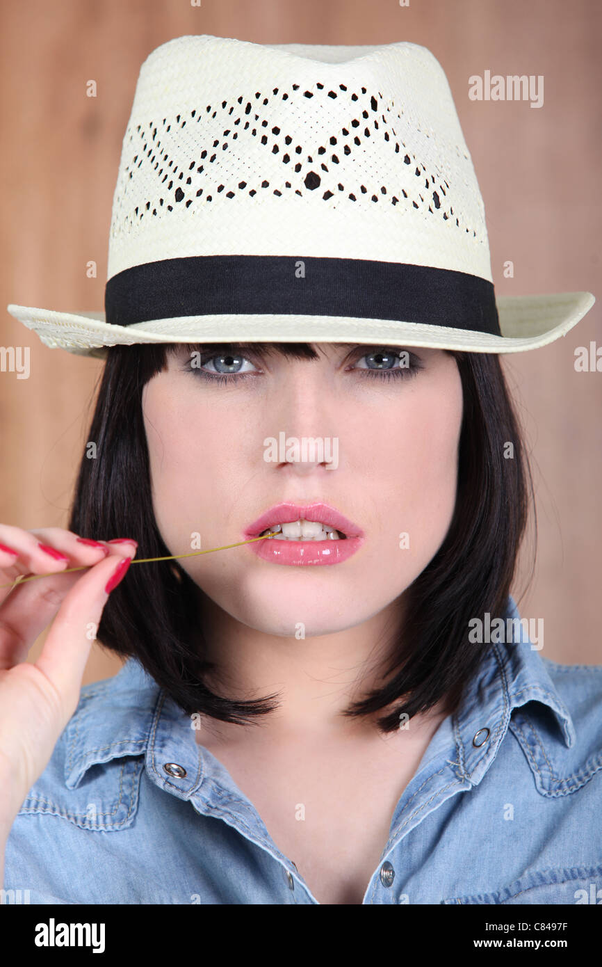 Woman wearing a Panama hat Stock Photo - Alamy