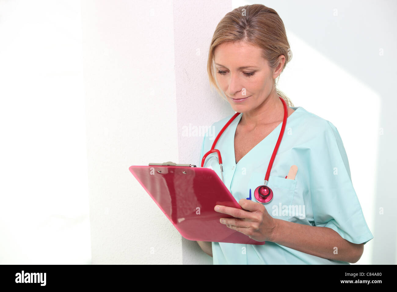 Nurse thinking writing hi-res stock photography and images - Alamy
