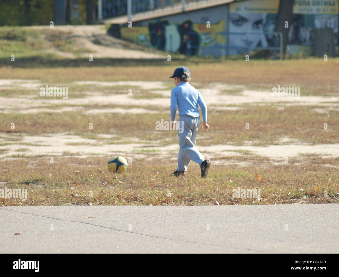 small boy playing football Stock Photo - Alamy