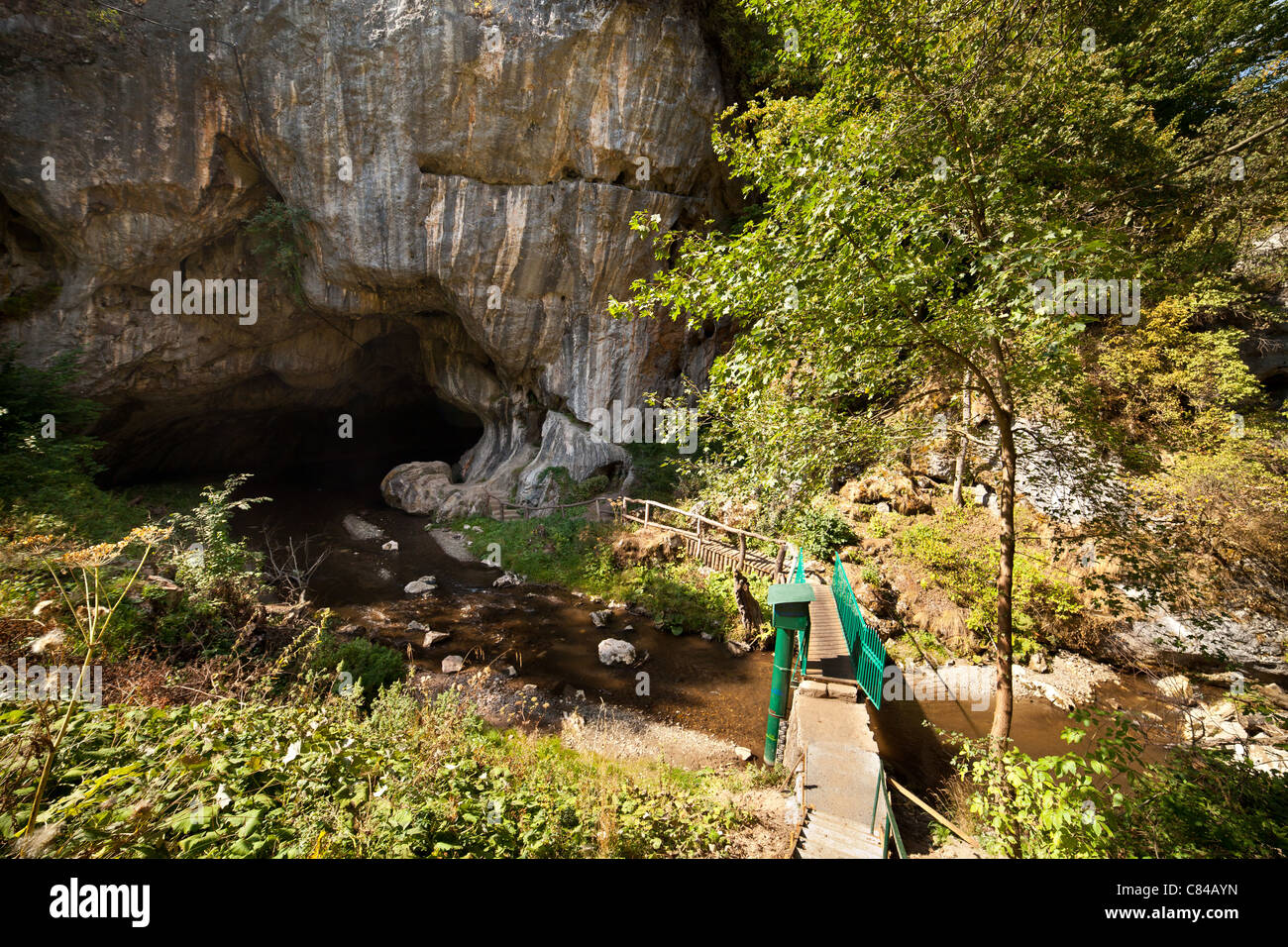 Entrance to the Bolii Cave in Romania, Parang mountain Stock Photo - Alamy